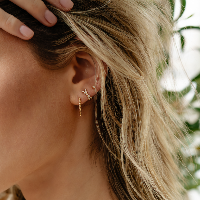 Diamond Huggie Earrings: Ava Bea Crossover Mini Huggies | Dana Rebecca ...